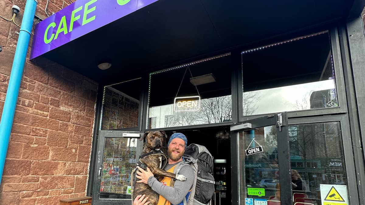 Round-Britain charity walker Tim Jones and dog Monty leave Minehead and ...