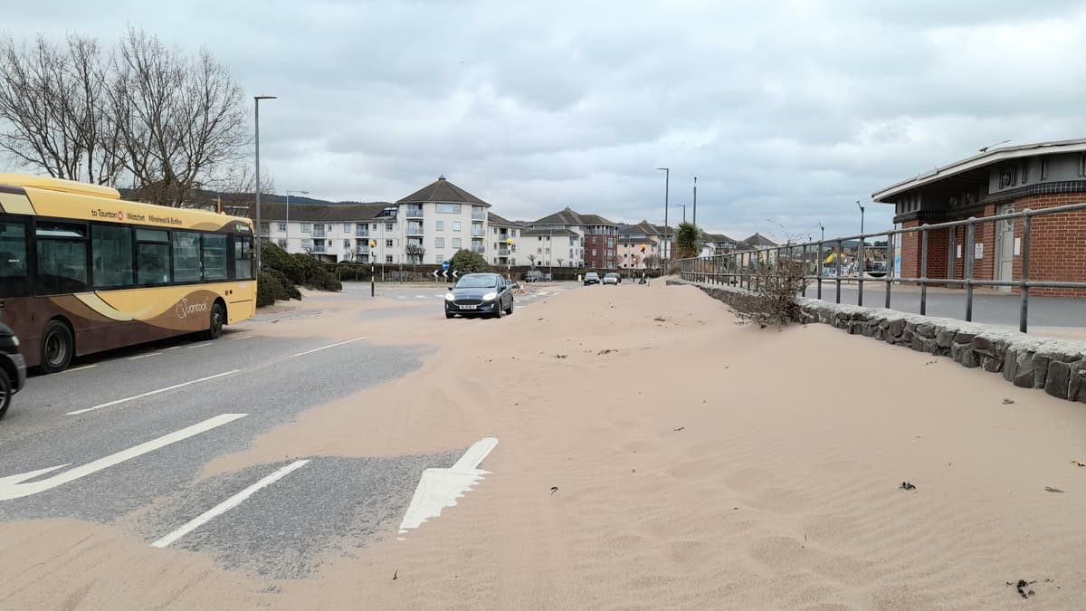 'Surreal' scenes in Minehead after tons of sand blocks main road | wsfp ...