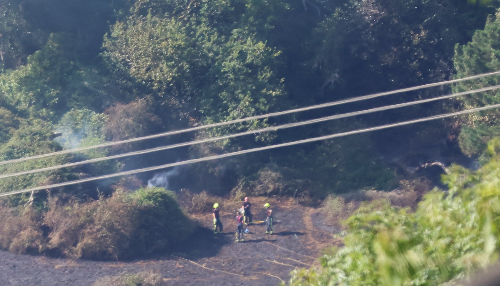Large-scale fire and rescue service response as 20 acres of grass burns ...